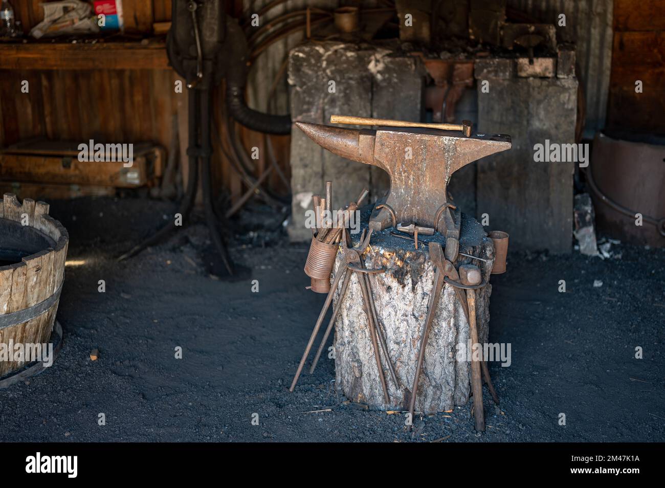 Interior detail of the anvil and the tools of the blacksmith of the ...