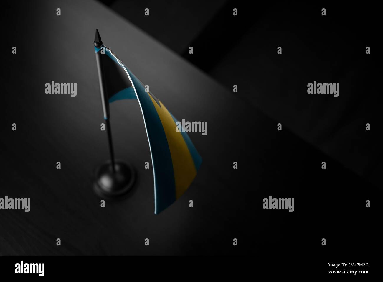 Small national flag of the Bahamas on a black background Stock Photo ...