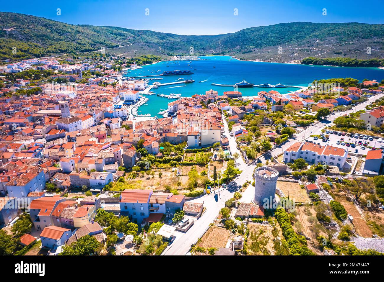 Adriatic town of Cres tower and bay aerial view, Kvarner archipelago of ...