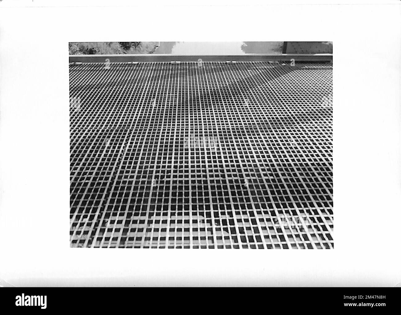 Open grid flooring Black and White Stock Photos & Images - Alamy