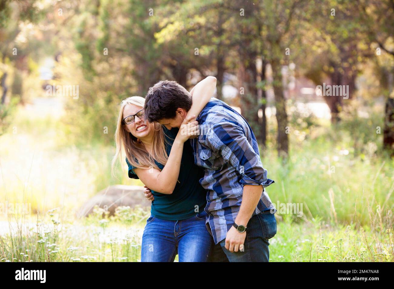 Silly laughing couple Stock Photo - Alamy