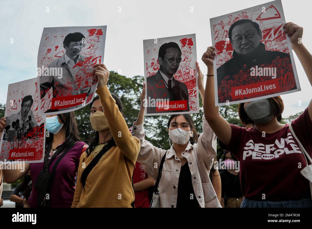 Manila, Philippines. 19th Dec, 2022. Filipino activists carry flags and ...