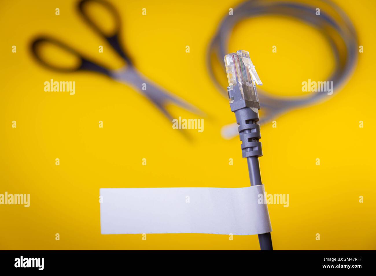 Internet cable and scissors cut it. Disconnection of Internet network ...