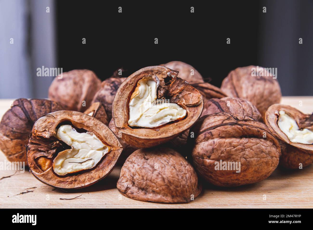 Walnut. Half walnut on natural background. Inshell nuts. Copyspace ...