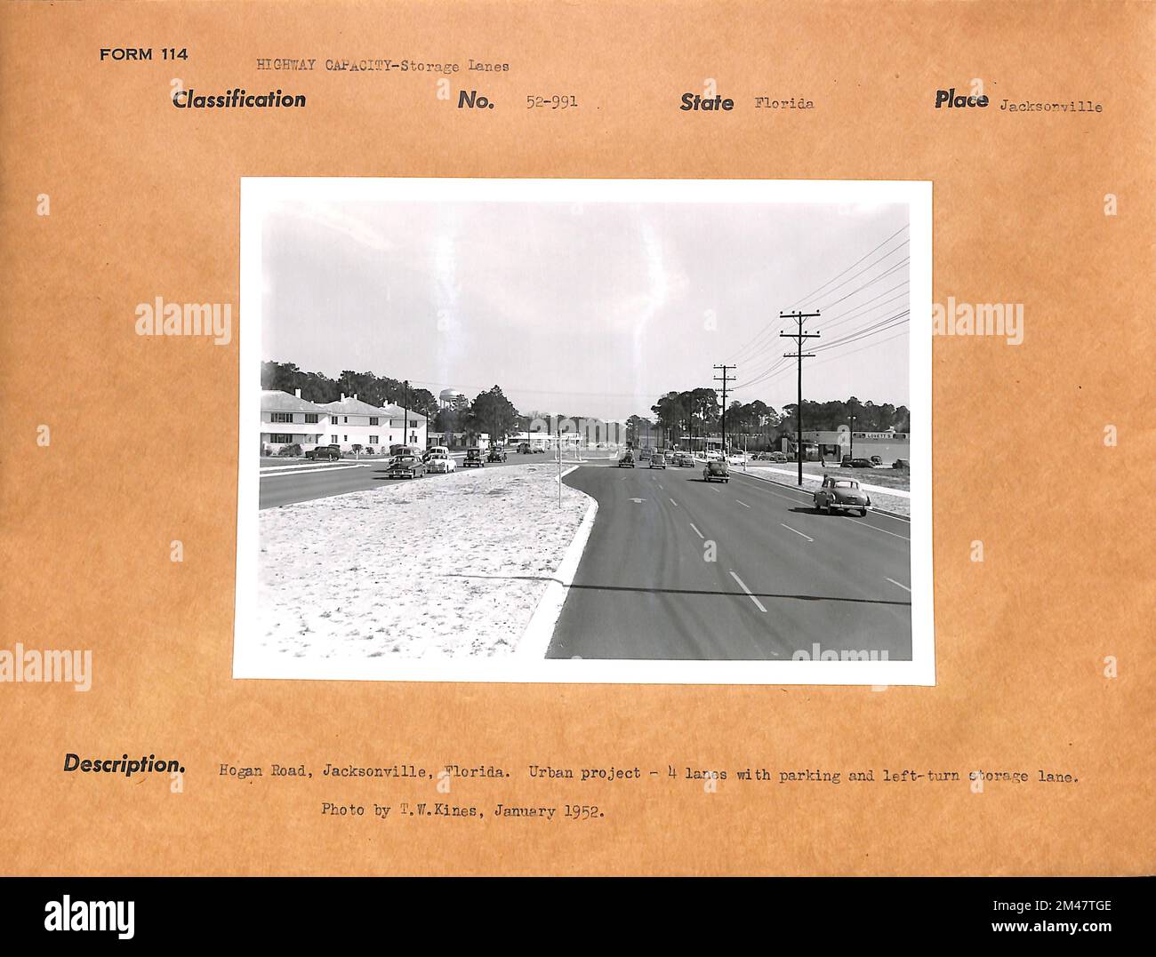 Four lanes with parking and left-turn storage lane. Original caption ...