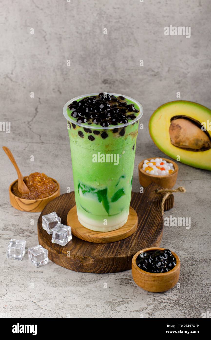 Boba or tapioca pearls is taiwan bubble milk tea in plastic cup with ...