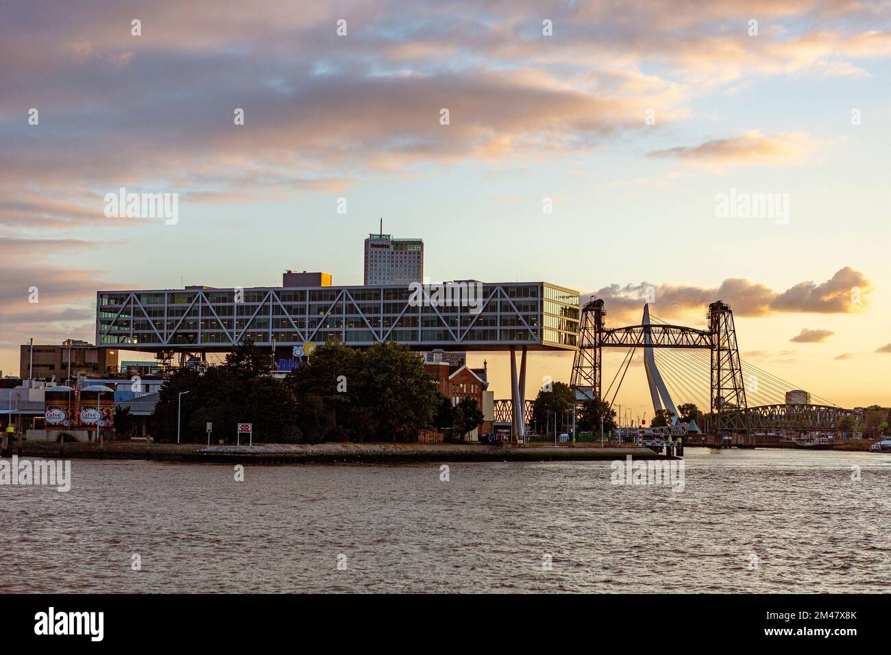Sunset view of Unilever modern office building build over the roofs of ...