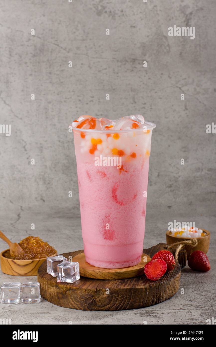 Boba or tapioca pearls is taiwan bubble milk tea in plastic cup with ...