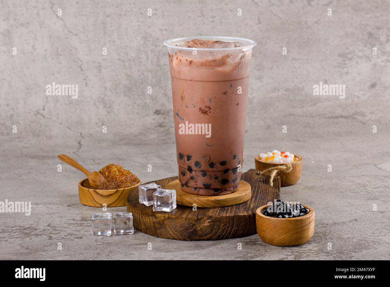 Boba or tapioca pearls is taiwan bubble milk tea in plastic cup with ...