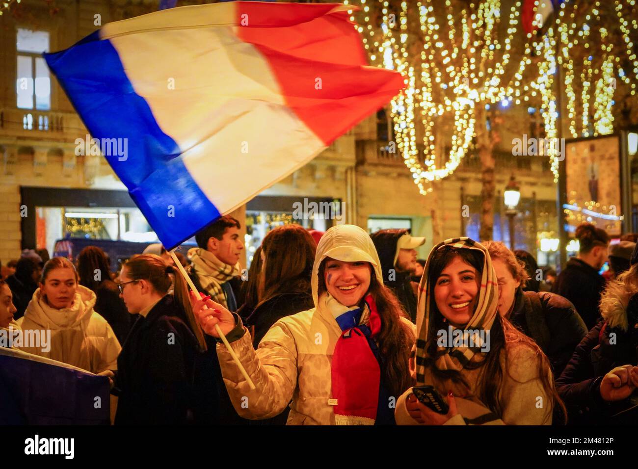 Paris, France. 19th Dec, 2022. A football fan waving a French flag in ...