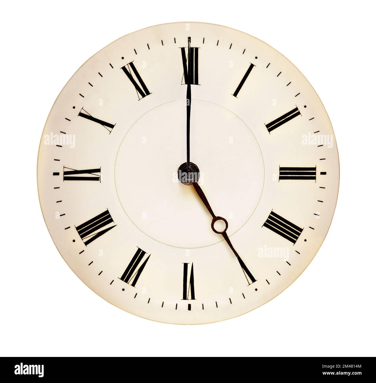 Antique clock face pointing at fiveo'clock isolated against white ...