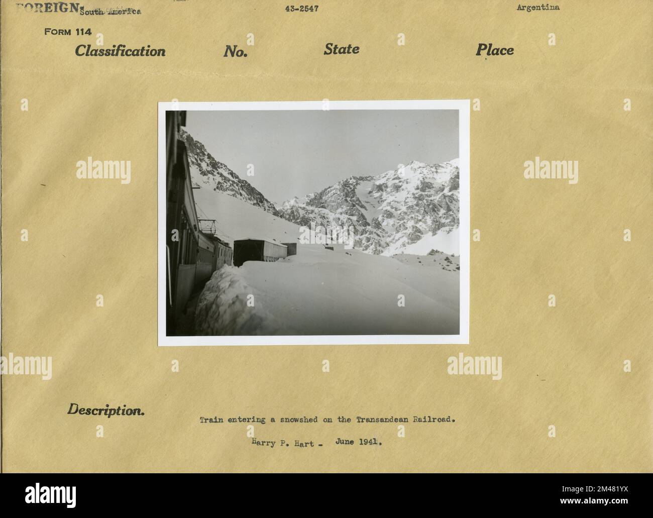 Train entering a snowshed. Original caption: Train entering a snowshed ...