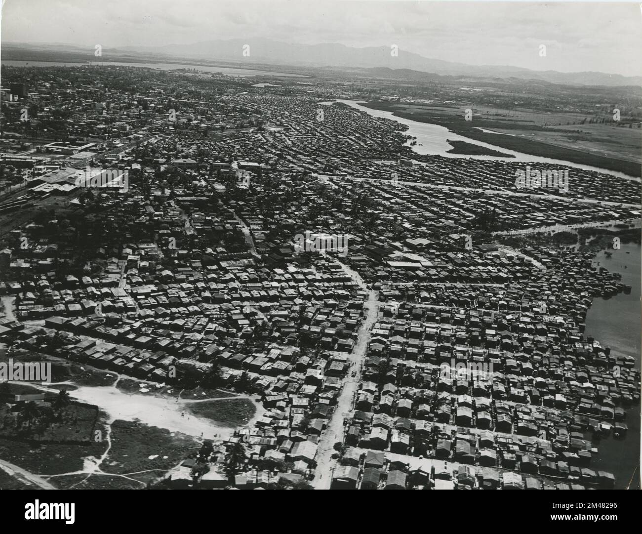 El Fanguito. Original caption: Aerial view of El Fanguito slum and ...