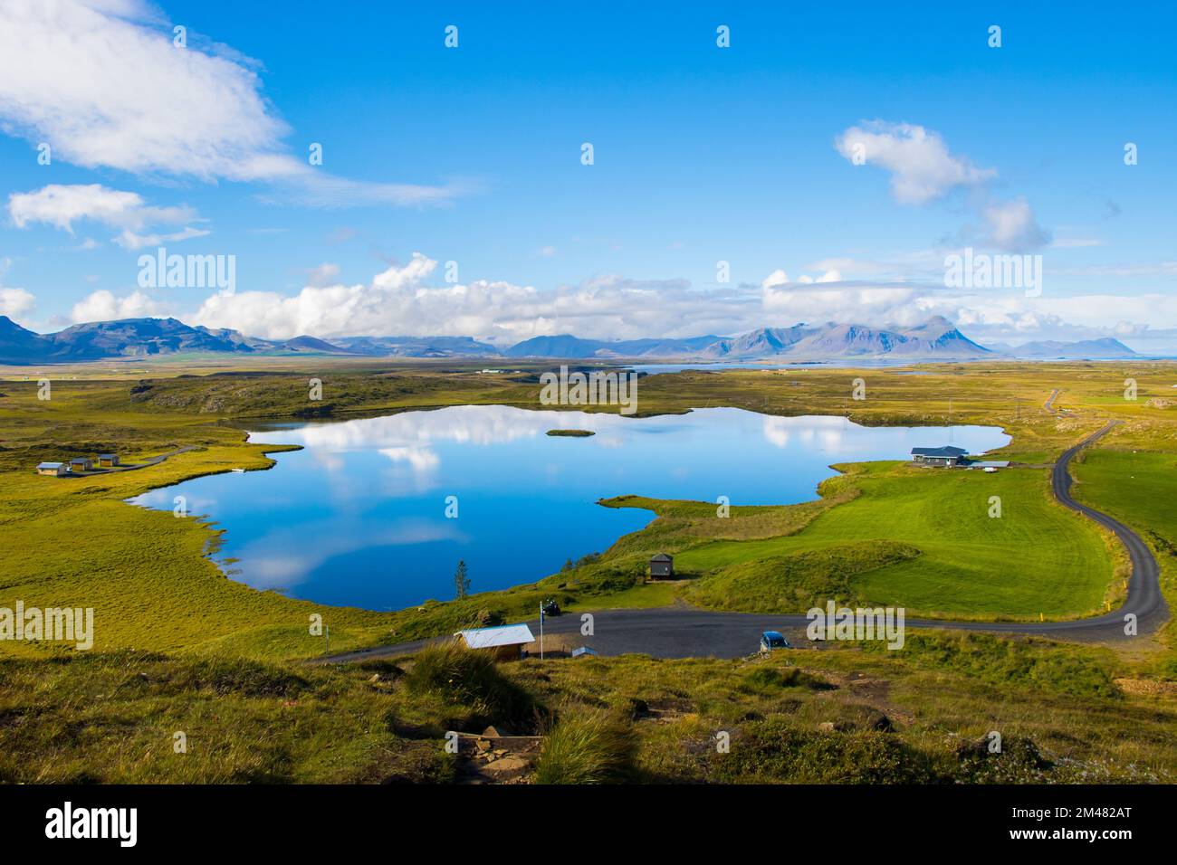 Green Landscape with Lake and Sky with Clouds Beautiful Helgafell ...
