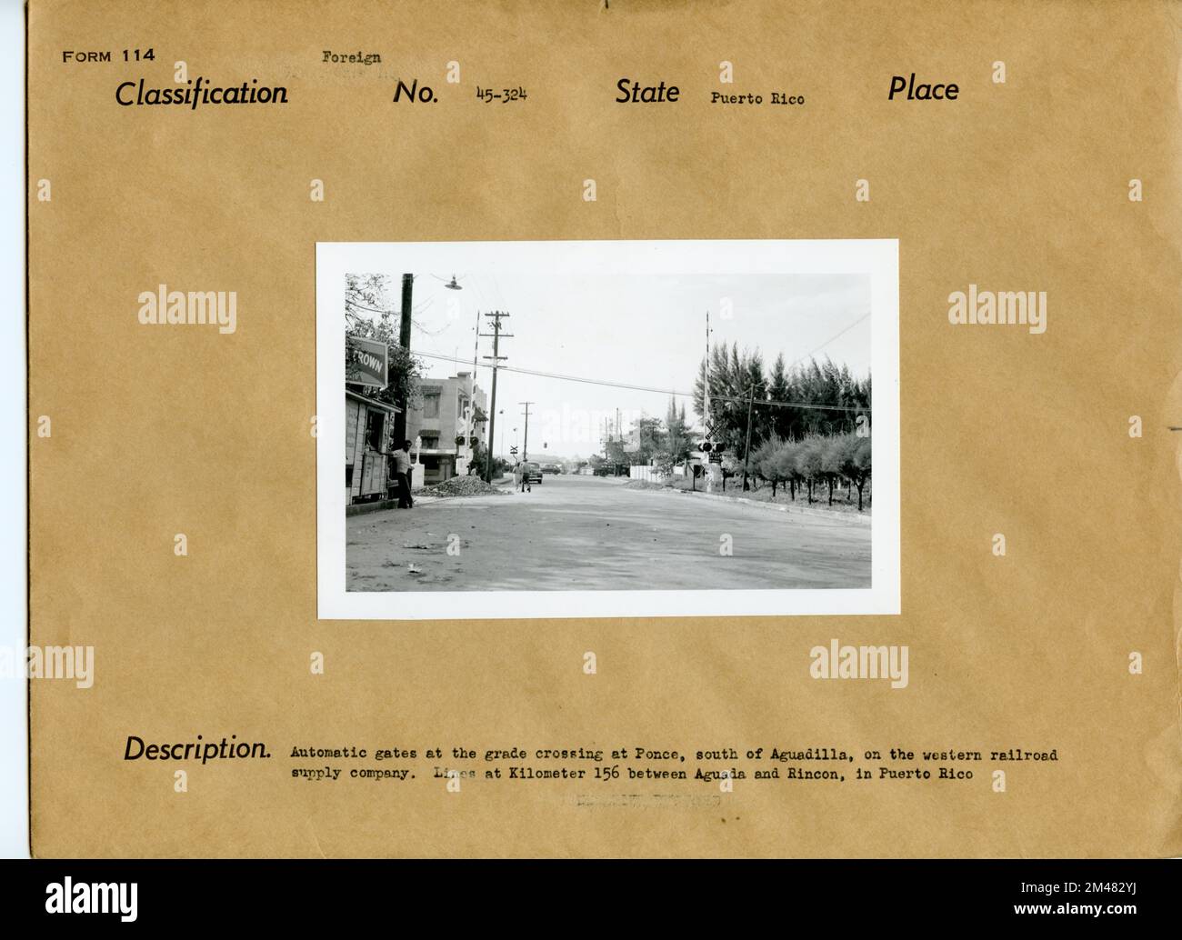 Automatic gates at the grade crossing at Ponce, south of Aguadilla ...