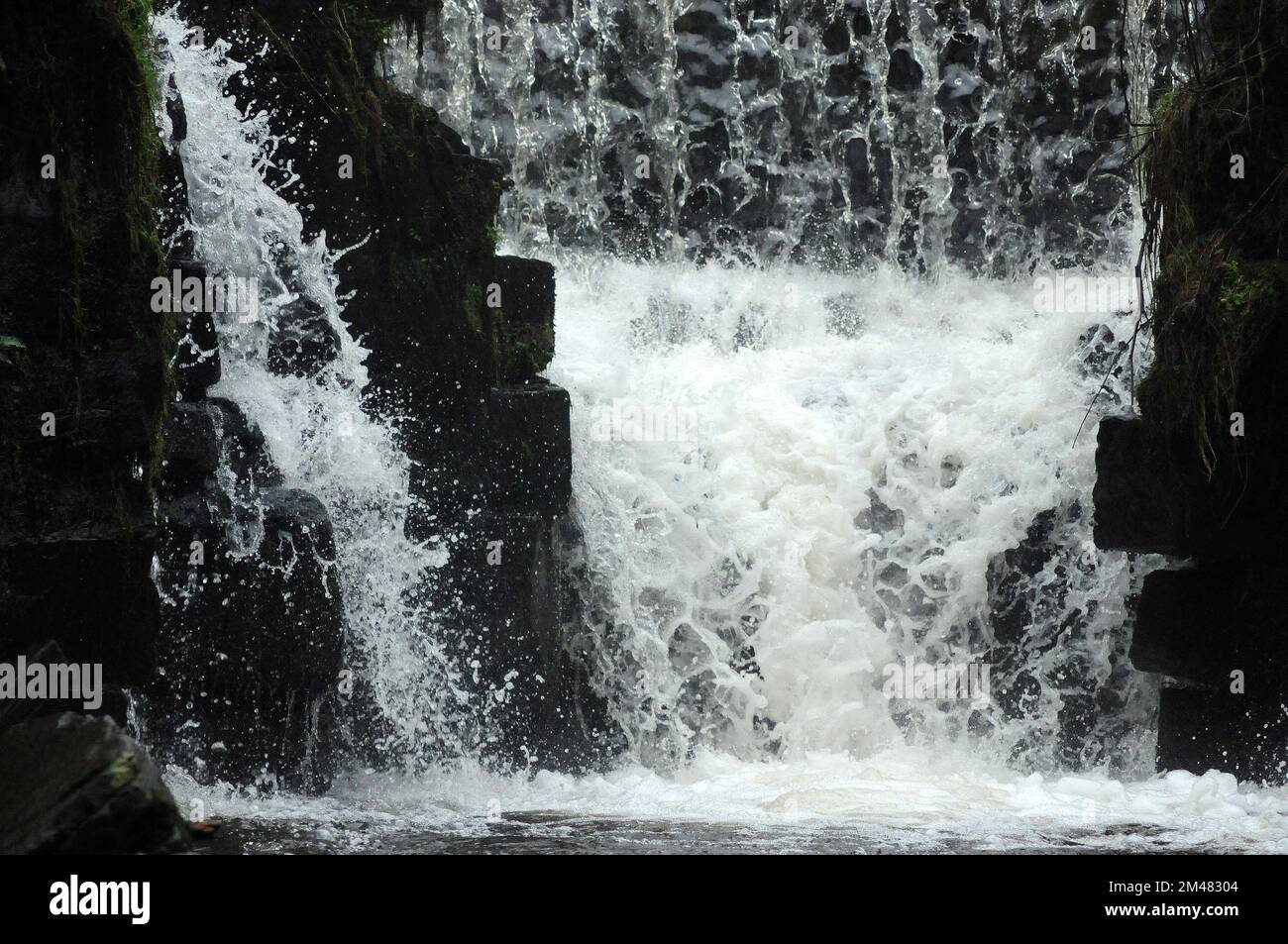 The man-made Penllergaer Waterfall. A drop of around 10 feet ...