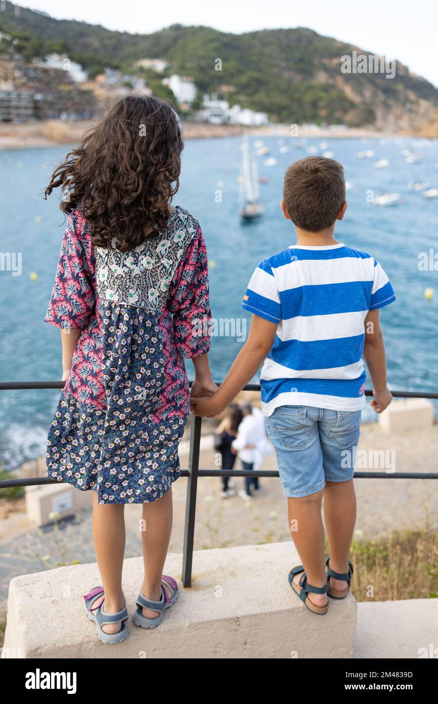 Kid looking boats hi-res stock photography and images - Alamy