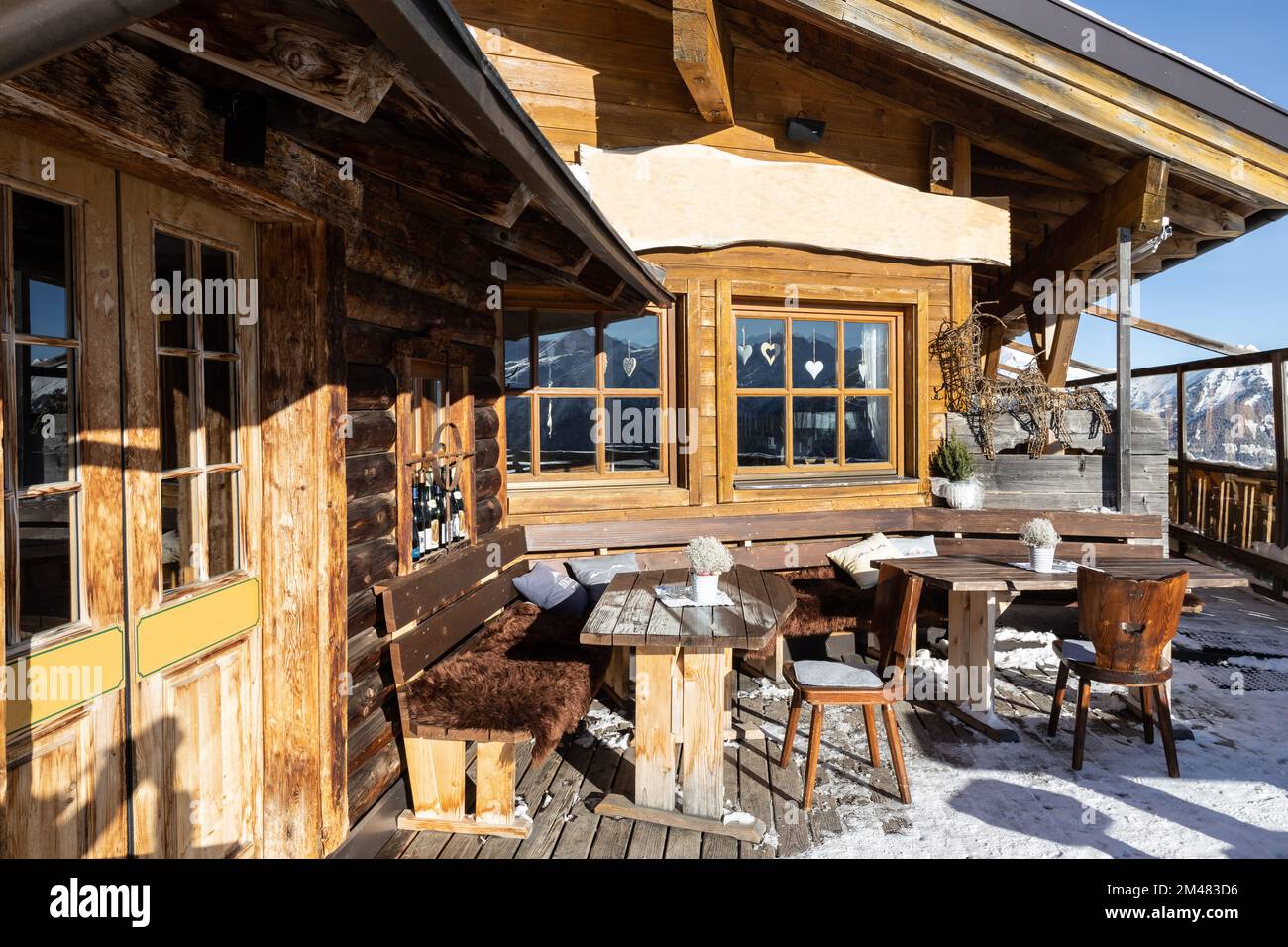 Ski hut with an entrance group and windows on the Alpine ridge, Austria ...