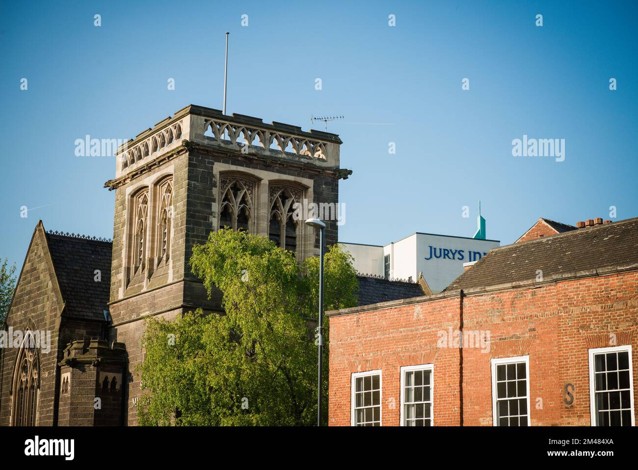 Saint Michael's church derby, reflected in shop window Stock Photo - Alamy
