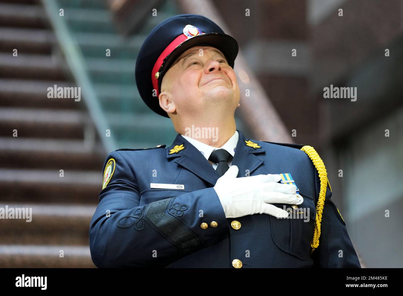 Incoming Toronto Police Chief Myron Demkiw looks up at cheering police ...