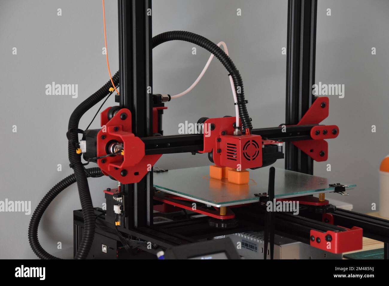 A 3D printing machine in operation, a concept of industrial work Stock ...