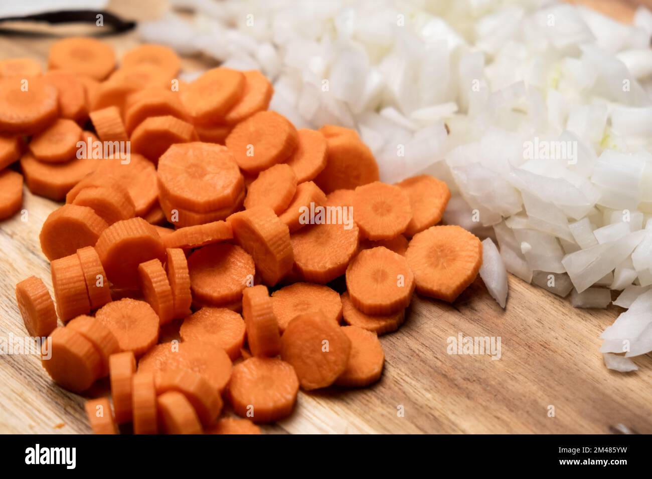Chopped carrots and onions. Preparation for cooking Stock Photo - Alamy