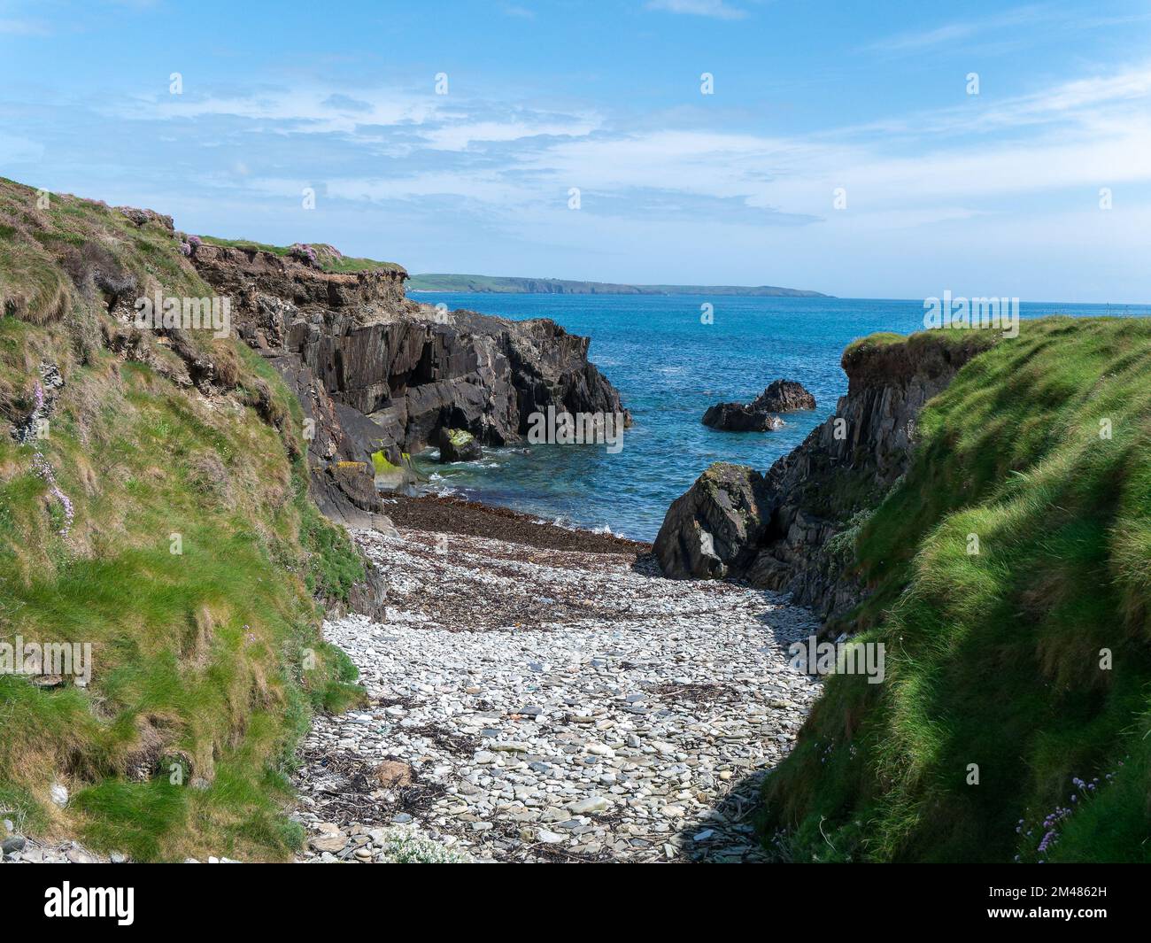 The rocky coast of the Atlantic Ocean on a sunny spring day. Seaside ...