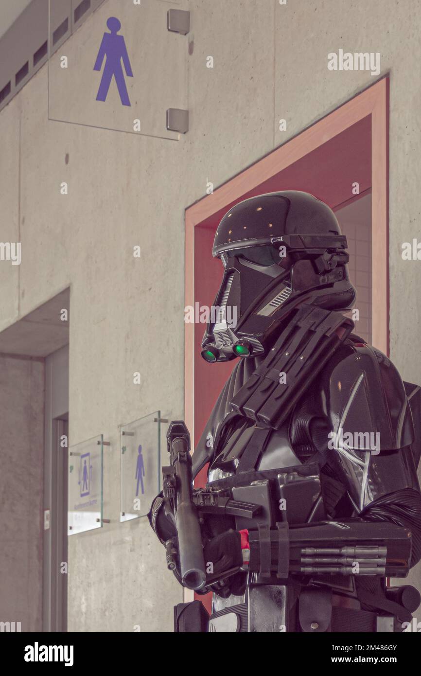 A portrait of a person cosplaying as a Shadow Trooper at the Comic-Con ...