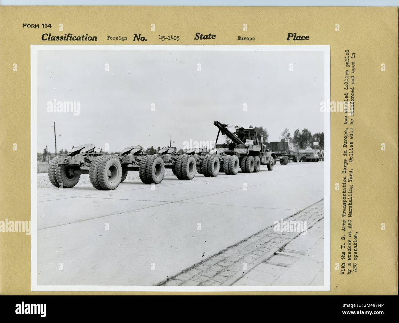 Two Wheeled Dollies Pulled By a Wrecker at ABC Marshalling Yard ...