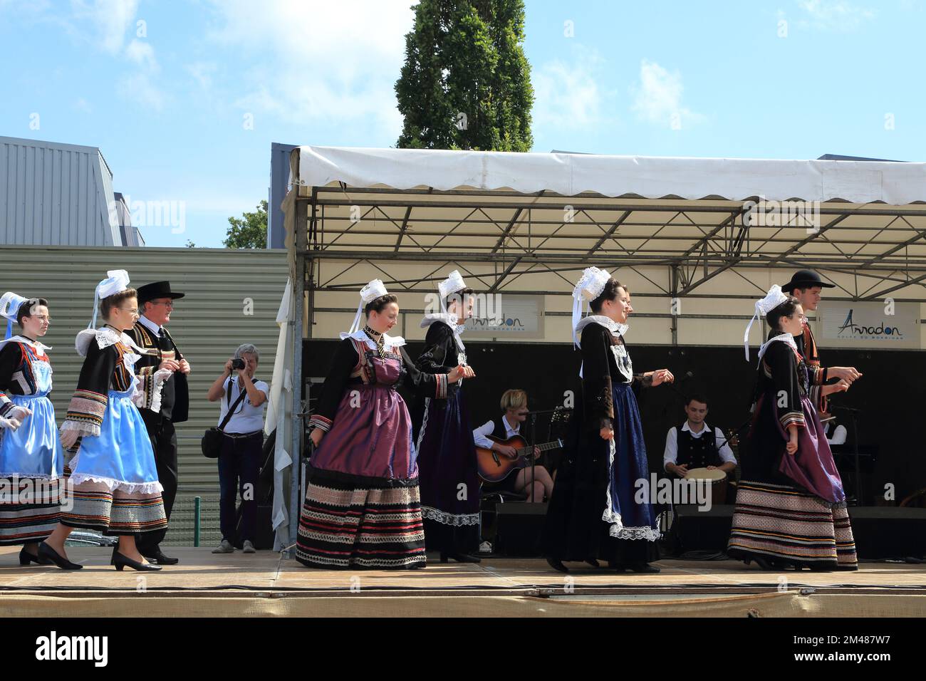Breton dancing in traditional costumes at Oyster Festival at Arradon ...