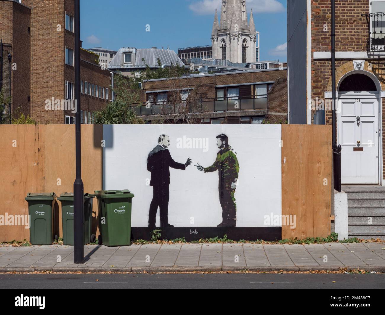 Street art by Loretto showing Vladimer Putin attempting to shake hands ...