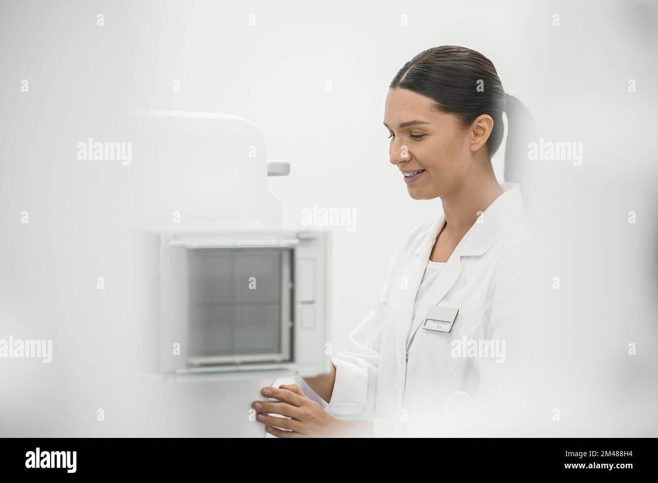 Pretty young female doctor hi-res stock photography and images - Alamy