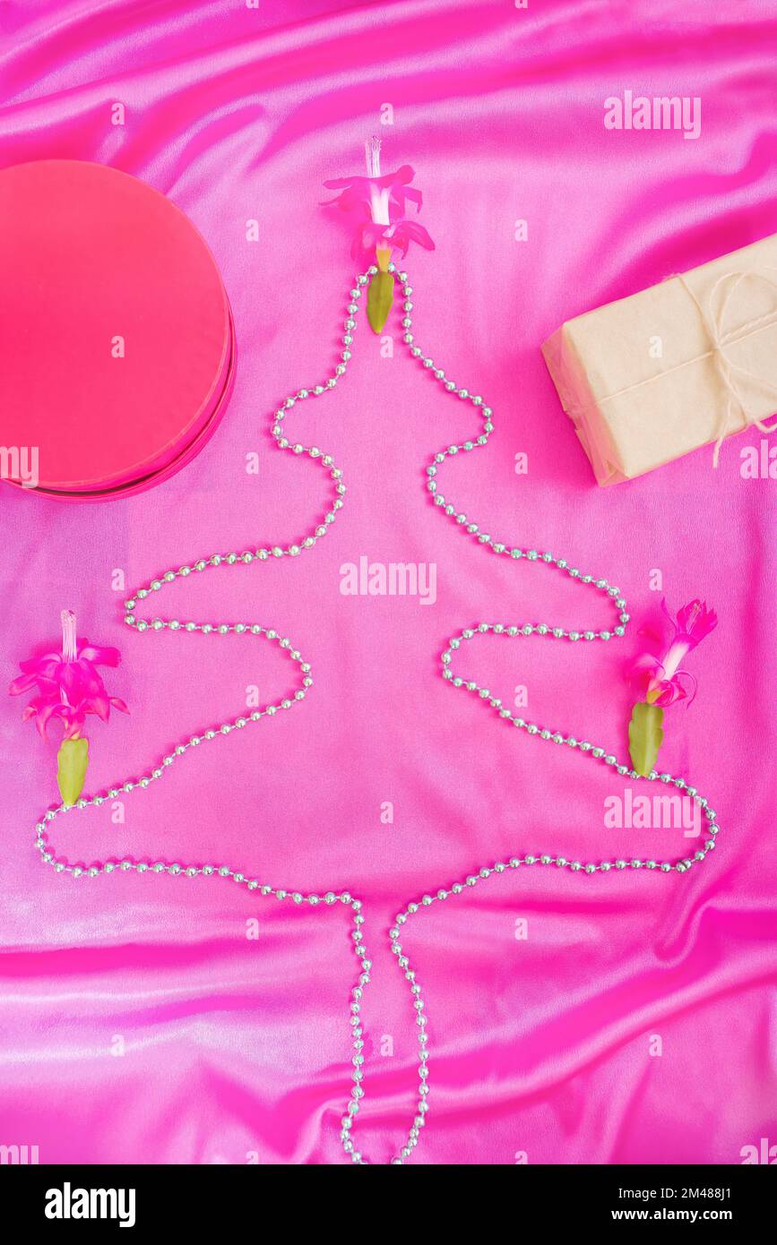Creative Christmas tree with decoration. Background color magenta Stock ...