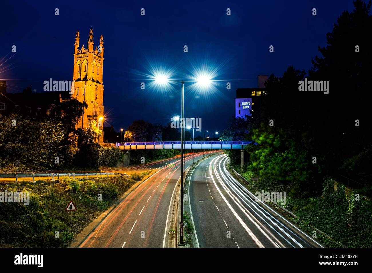 Night time in derby England with roads and st Marys church in the ...