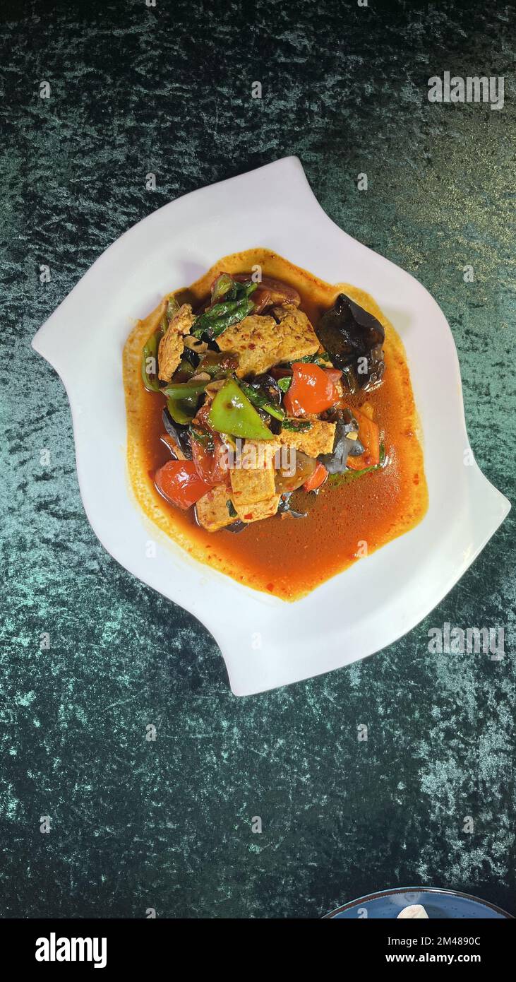 asian spicy dish with soy bean tofu curd Stock Photo - Alamy