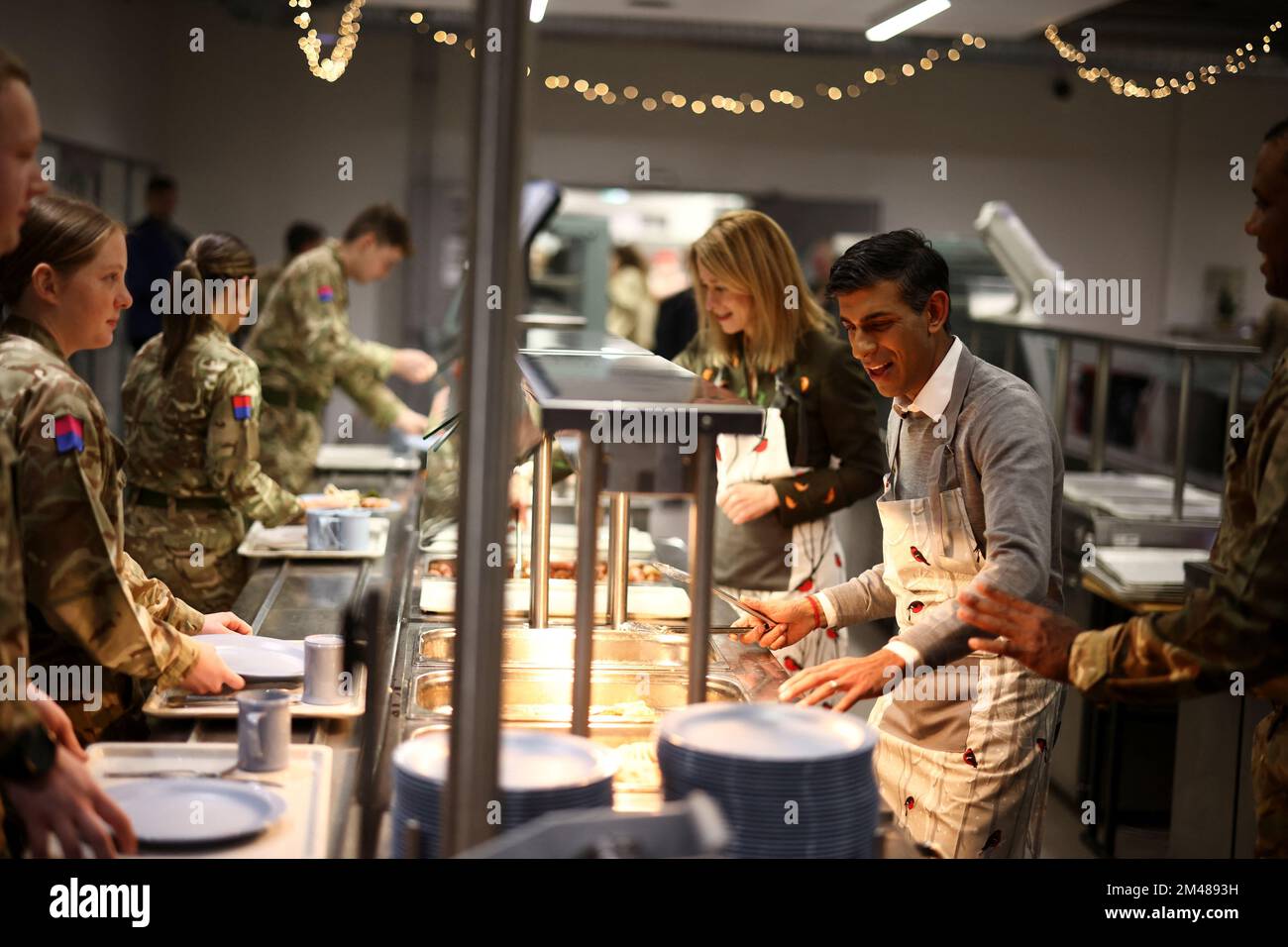 Prime Minister Rishi Sunak serves Christmas dinner to troops at the ...