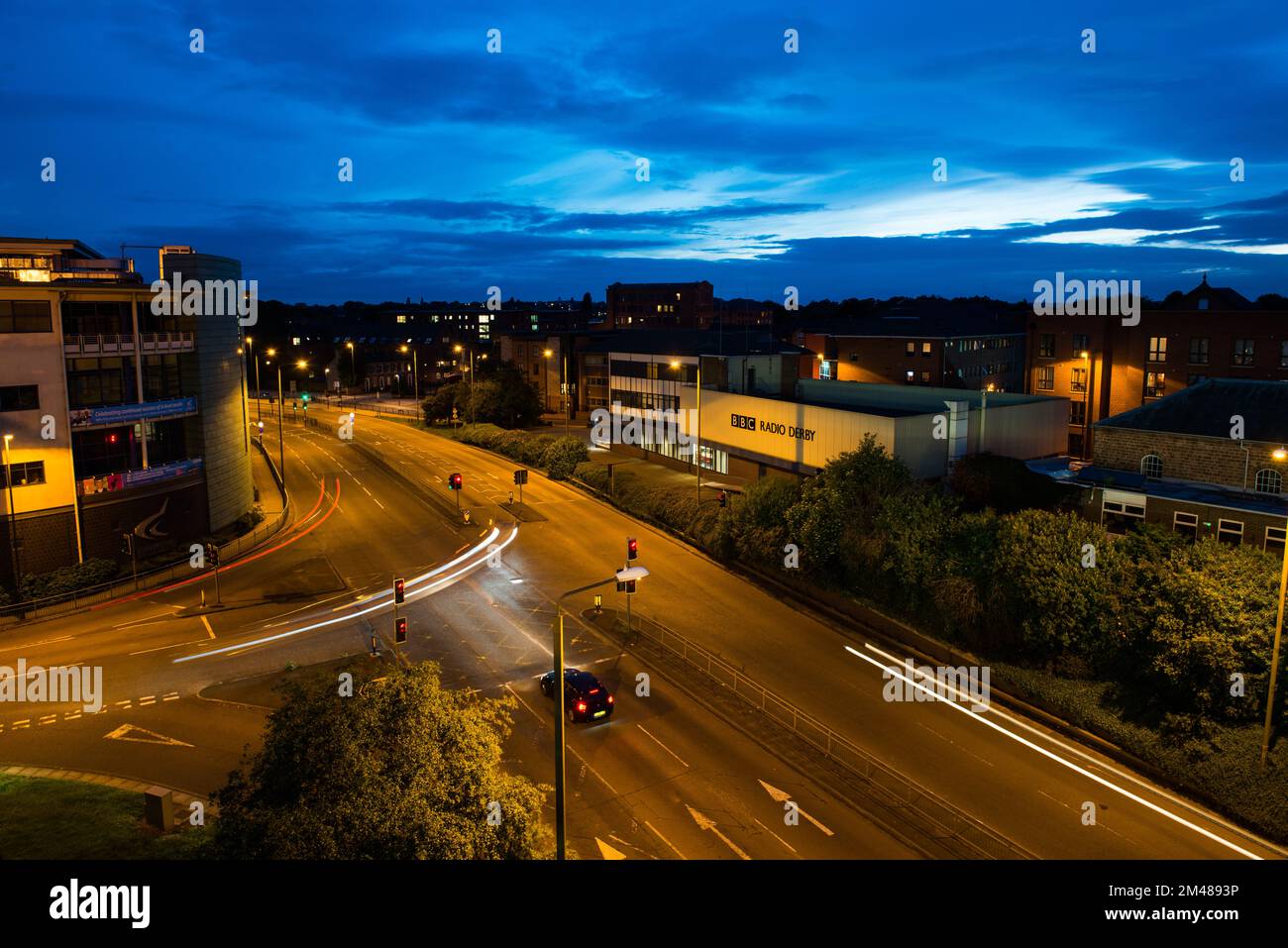 Aerial view of lara croft way in derby, at night with radio derby and ...