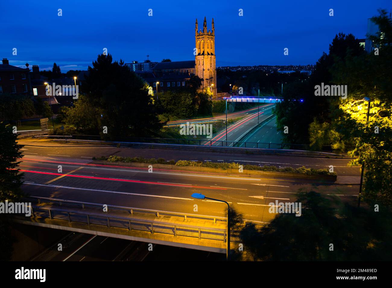Night time in derby England with roads and st Marys church in the ...