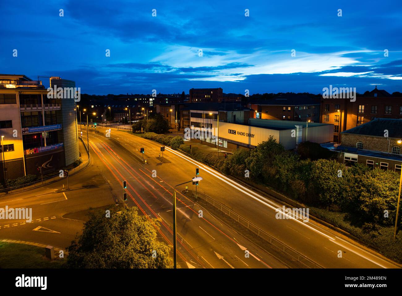 Night time in derby England with roads and st Marys church in the ...