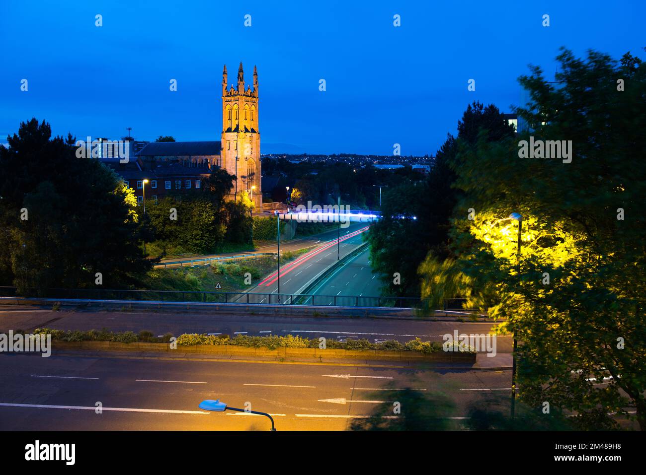 Night time in derby England with roads and st Marys church in the ...