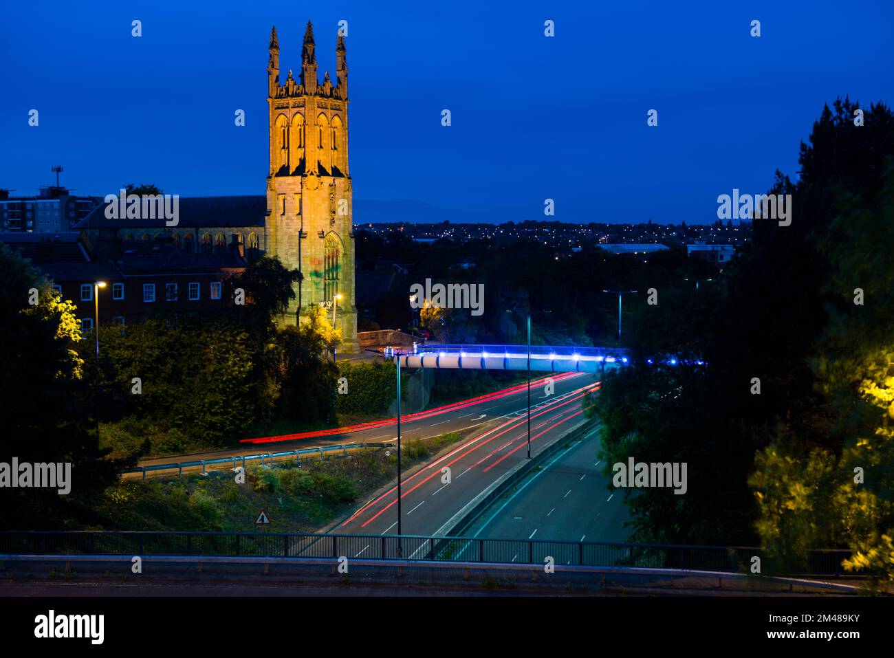 Night time in derby England with roads and st Marys church in the ...