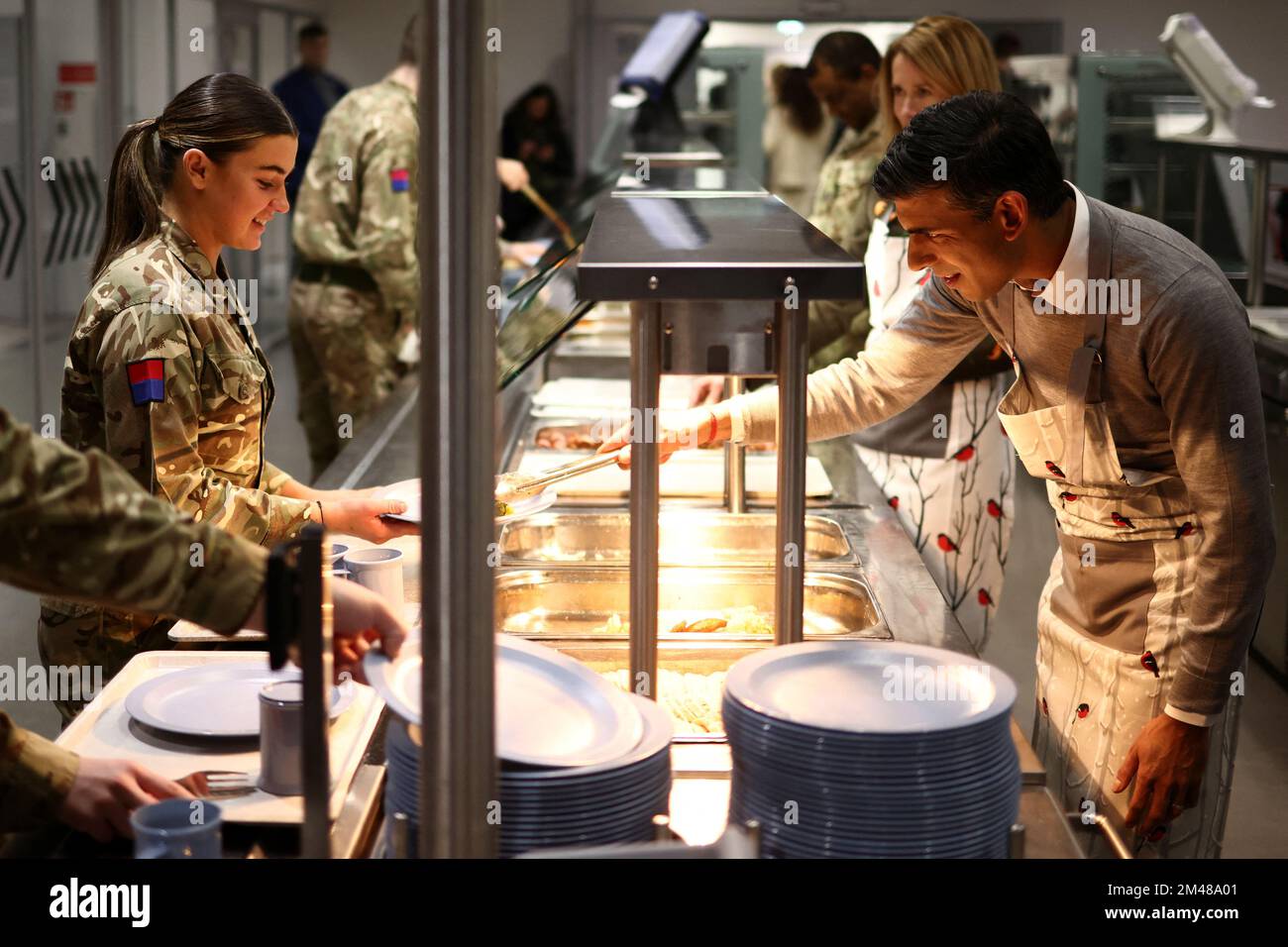 Prime Minister Rishi Sunak serves Christmas dinner to troops at the ...