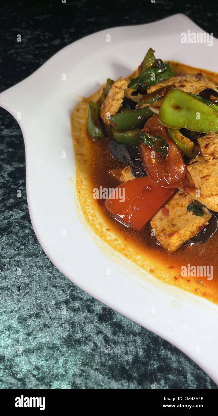 asian spicy dish with soy bean tofu curd Stock Photo - Alamy