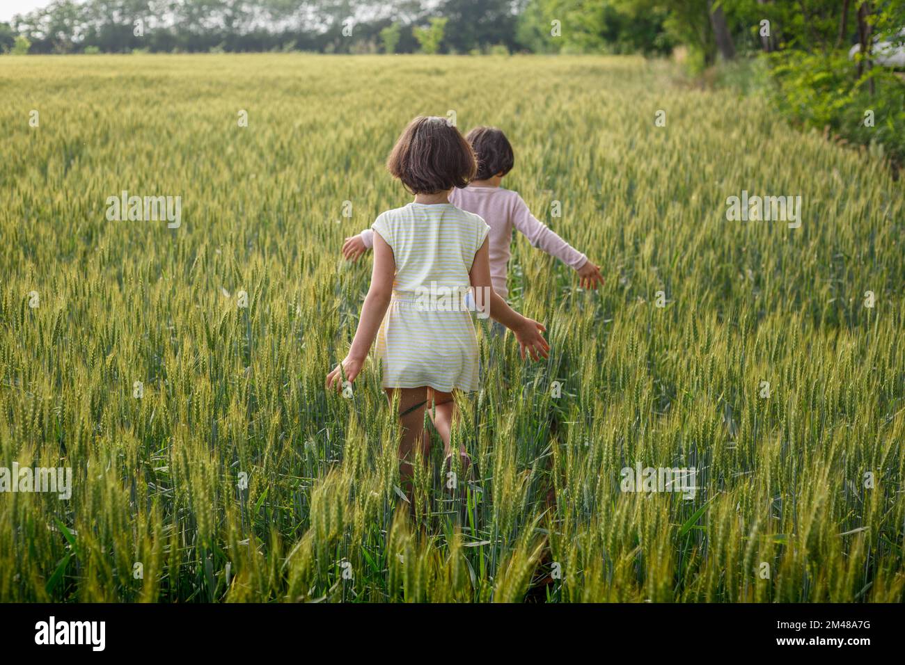 Two girls walking dark hi-res stock photography and images - Alamy