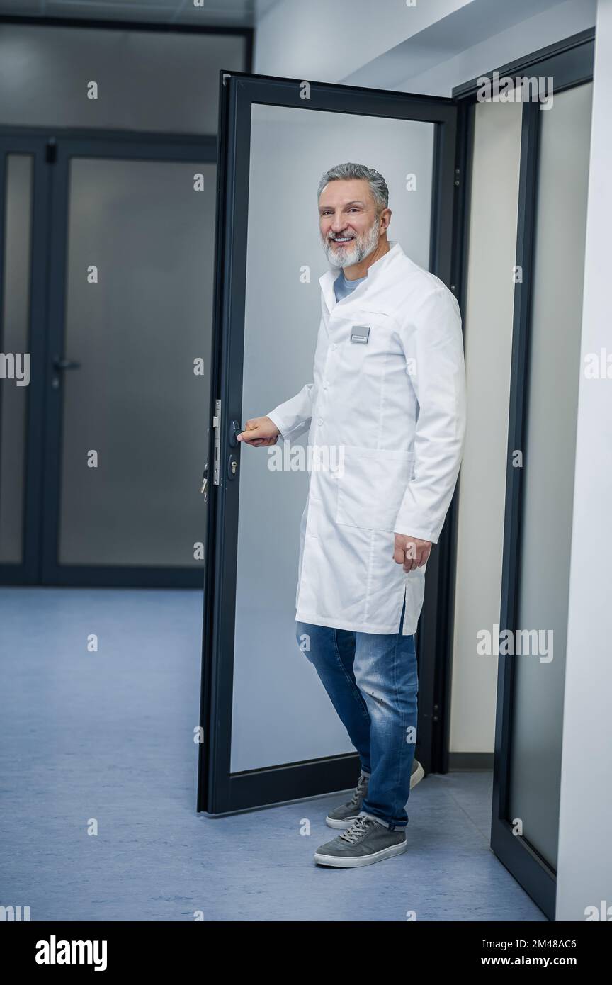 Male doctor entering hospital corridor hi-res stock photography and ...