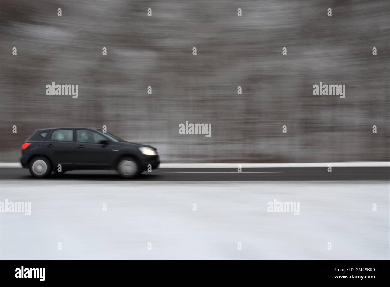 Another car . Car panning beside woods. Speed around 60m/h. Stock ...