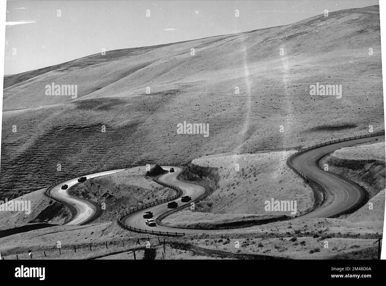 Highway leading down to the gorge. Original caption: Highway leading ...