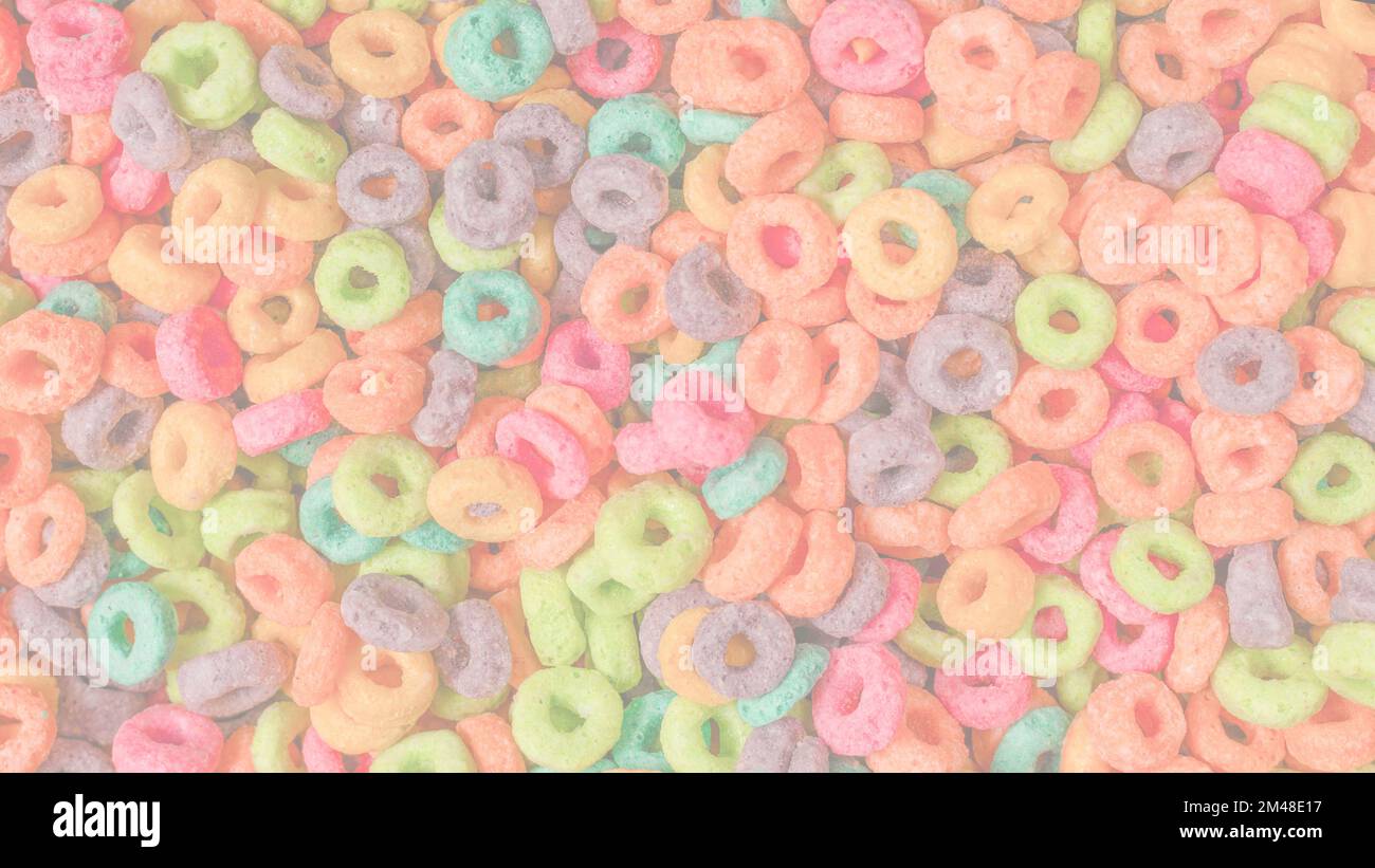 Sweet multicolored flakes, cereal loops as a background Stock Photo - Alamy