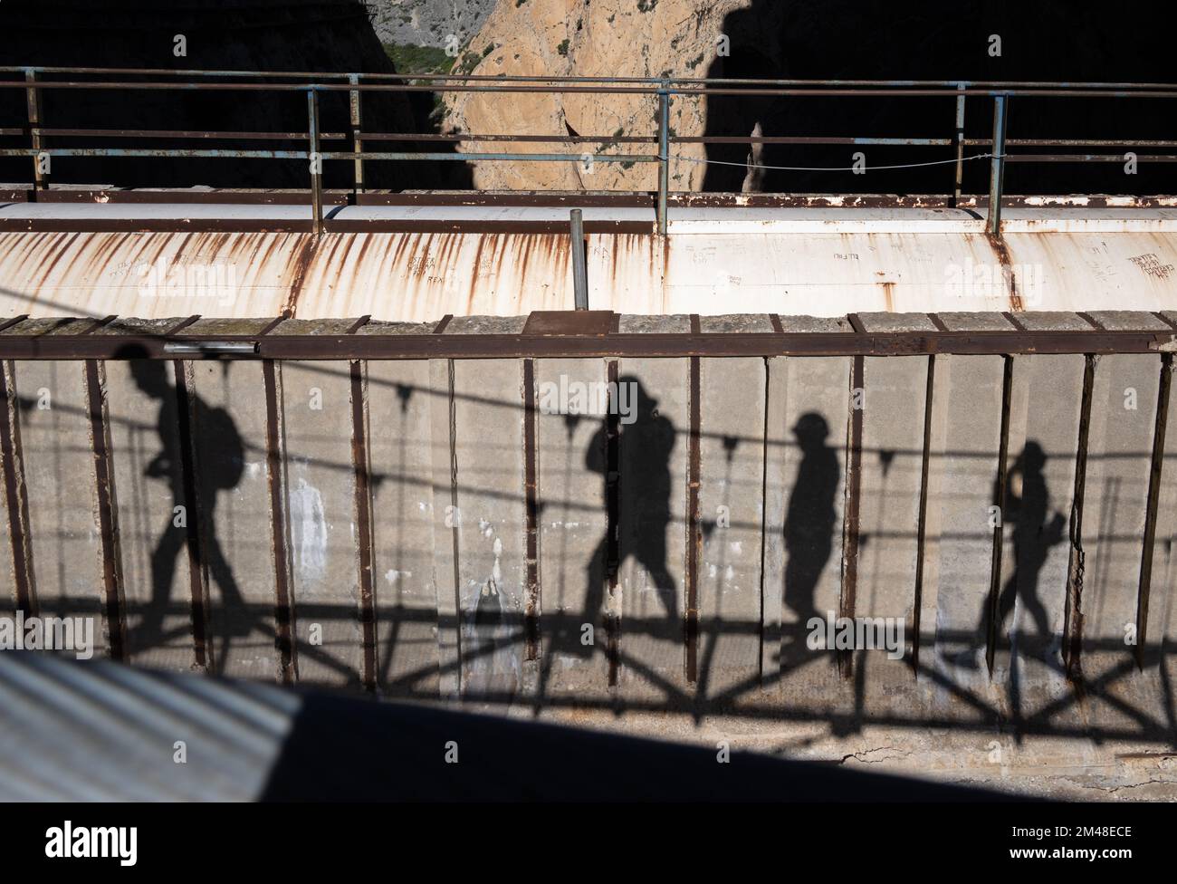 A shadow cast upon the Bridge Crossing El Chorro gorge near Malaga ...