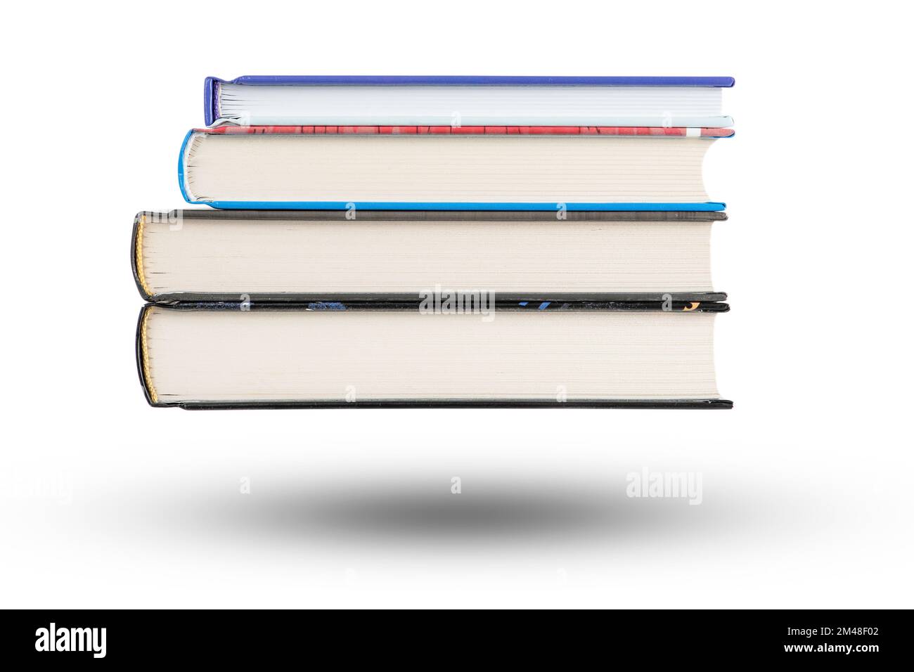 stack of books, isolate on white background. A stack of books of ...